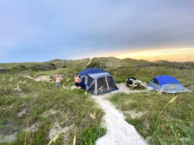 Camping with dunes as your backdrop &ndash; where the loudest noise is the distant surf and stars serve as your nightlight.