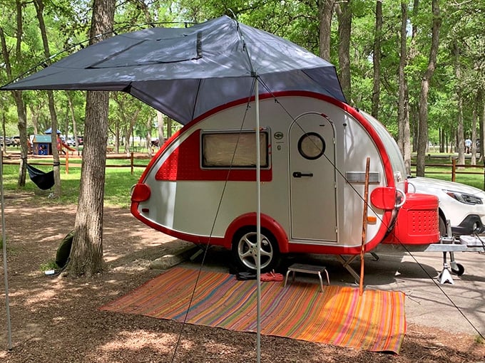 Camping goes stylish with this teardrop trailer setup. It's like bringing your tiny home to the wilderness&mdash;comfort with a side of birdsong.