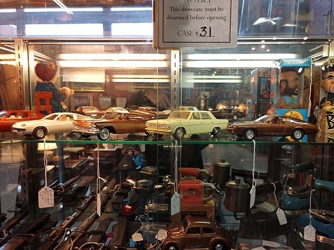 Miniature automotive history parked behind glass—these aren't just toys, they're gateways to memories of first cars and Sunday drives.