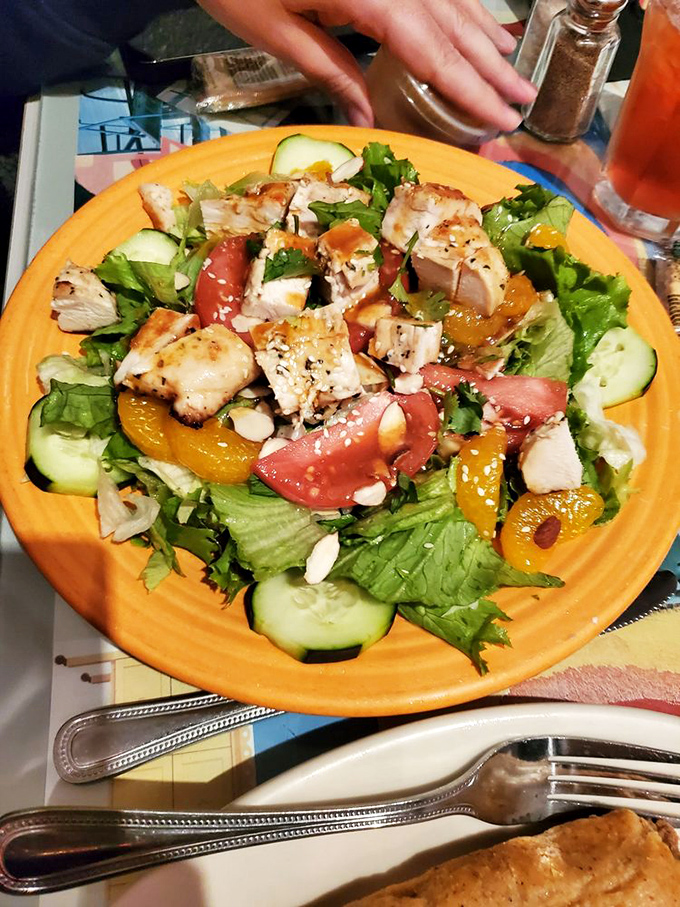 This chicken salad isn't playing around&mdash;grilled chunks mingling with greens, tomatoes, and mandarin oranges in what can only be described as a bowl of sunshine.