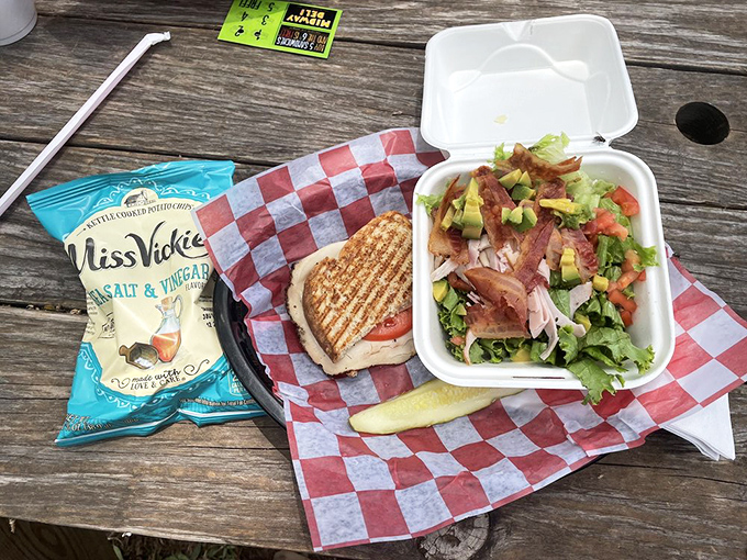 Fresh greens, vibrant veggies, and a sandwich that doesn't skimp on fillings. Proof that Midway knows balance isn't just for gymnasts.