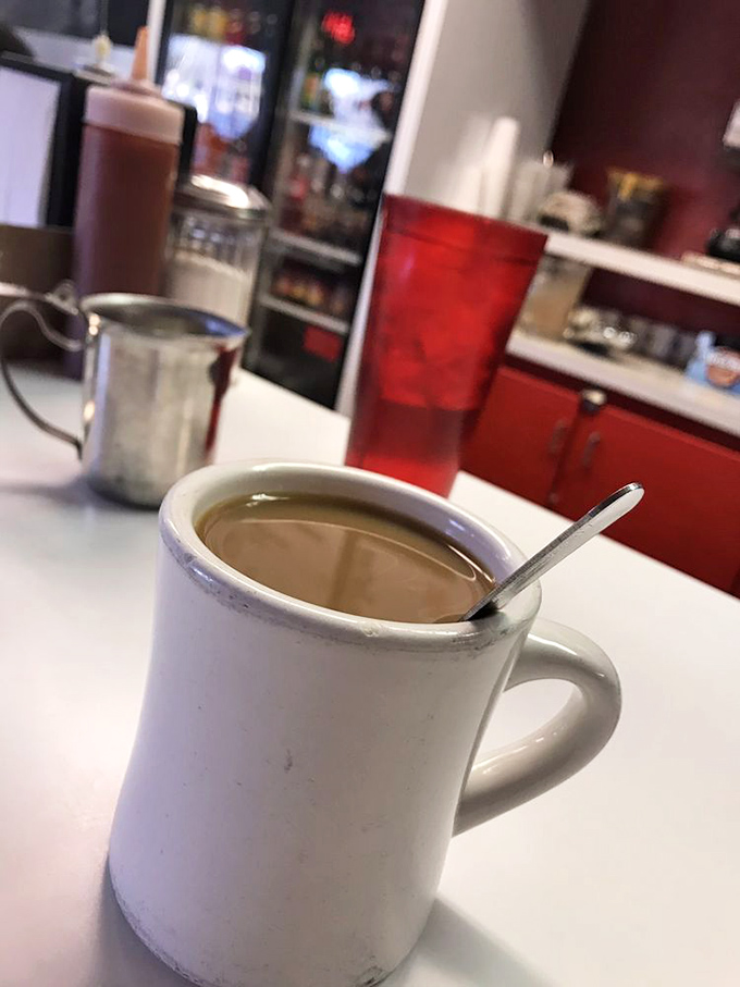 Coffee served in a classic mug&mdash;no fancy latte art needed. This cup promises to jump-start your day with the same no-nonsense approach as everything else at Johnny's.