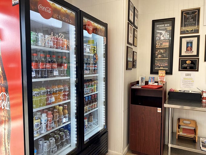 The drink cooler stands ready for those who need to balance sweet with refreshing. Because even donut enthusiasts need hydration between bites.