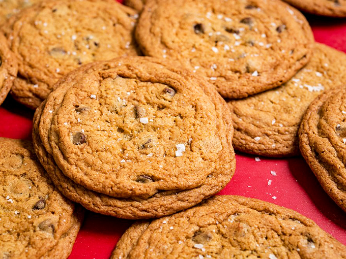 Cookies with that perfect crisp-edge-to-chewy-center ratio. The sea salt flakes are like tiny flavor explosions that make your taste buds do a happy dance.