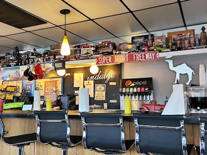 The counter where barbecue dreams come true, complete with vintage car memorabilia and a sign that simply says "indulge." Truer words were never displayed.