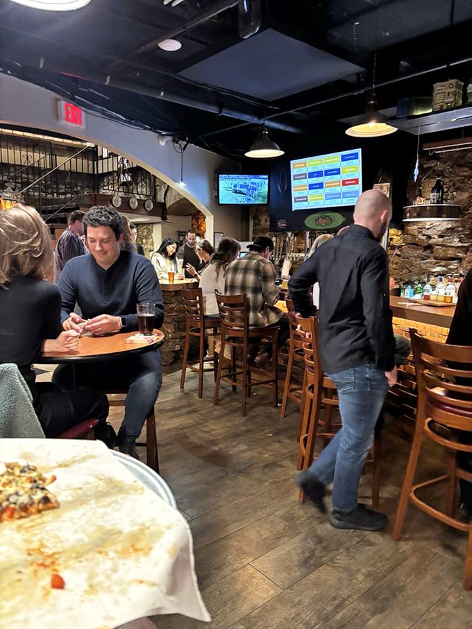 The bar area buzzes with the energy of people who've discovered something special. Conversations flow as freely as the craft brews.