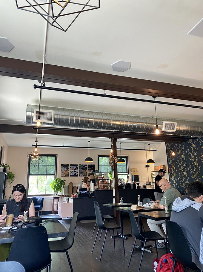 Coffee shop choreography at its finest. Each table a small island of caffeinated contentment.