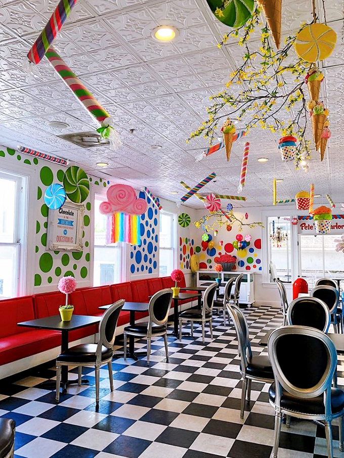 The dining area looks like what would happen if Willy Wonka designed a 1950s diner&mdash;complete with candy-inspired decor and checkered floors.