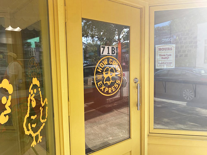 The cheerful door with its chicken mascot practically winks at passersby, as if saying "Yes, we have what you're craving."