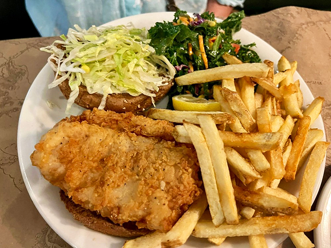 Crispy on the outside, tender within&mdash;this fish sandwich with its golden fries is the comfort food equivalent of a warm hug from someone who really knows their way around a fryer.