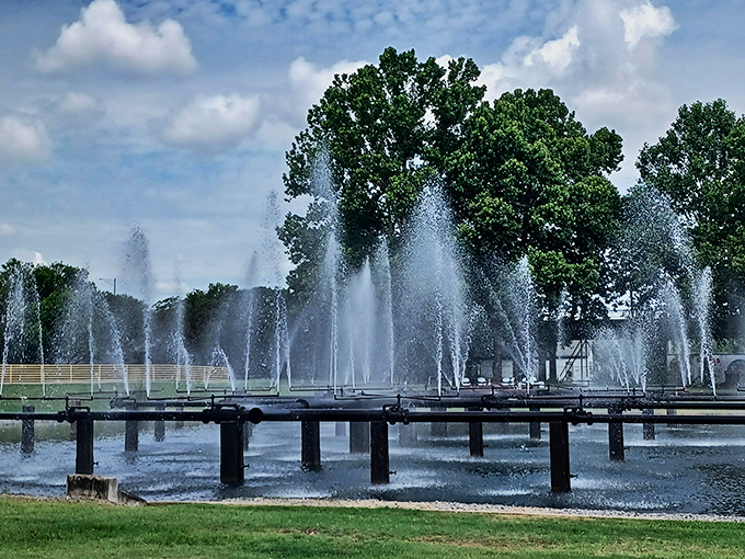 Rust-colored towers and cylinders stand like ancient monuments, their purpose mysterious to modern eyes but once crystal clear to those who built Birmingham.