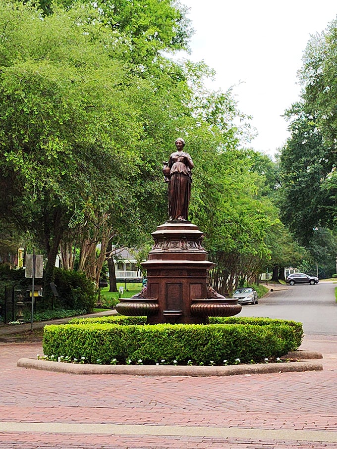 This stately fountain and statue stands like a dignified time capsule in the heart of Jefferson, silently judging modern fashion choices for over a century.