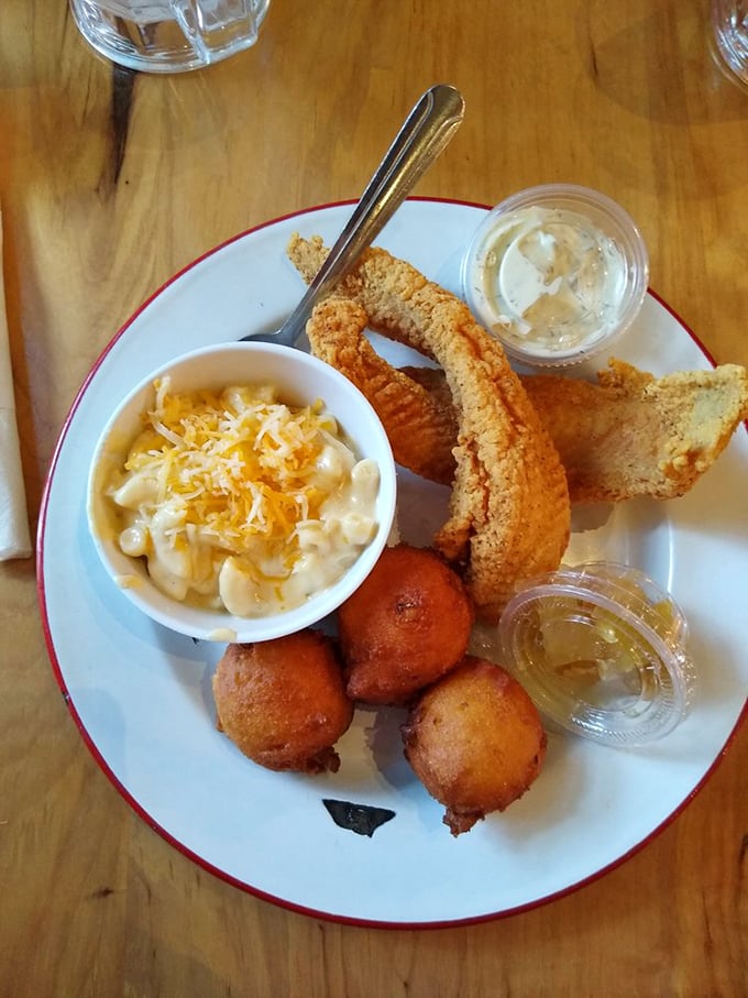 Catfish this crispy deserves its own fan club, while those hush puppies are the opening act nobody wants to miss.