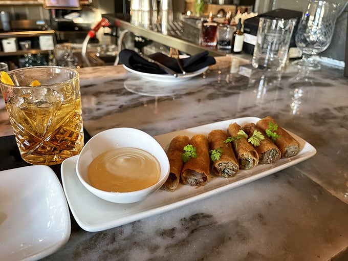 These aren't your average spring rolls. Crispy, golden cylinders of goodness with the perfect dipping sauce &ndash; resistance is futile.