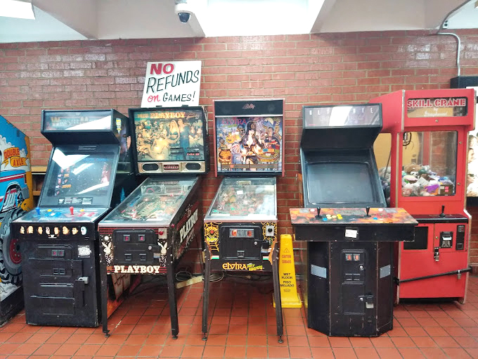 Between features, these pinball machines and arcade games offer a different kind of finger-flickin' entertainment. Elvira would be proud.