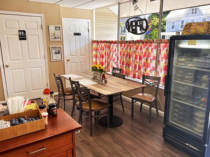 The bright, cheerful dining area feels like eating in a friend's kitchen&mdash;if your friend happened to be an exceptional cook with a thing for floral curtains.