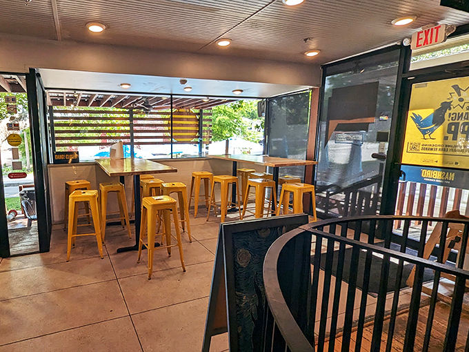 Yellow stools invite you to perch and ponder life's important questions, like "How soon is too soon to come back tomorrow?"