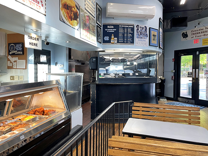 Light blue walls adorned with local memorabilia&mdash;the visual equivalent of "y'all make yourselves at home now."