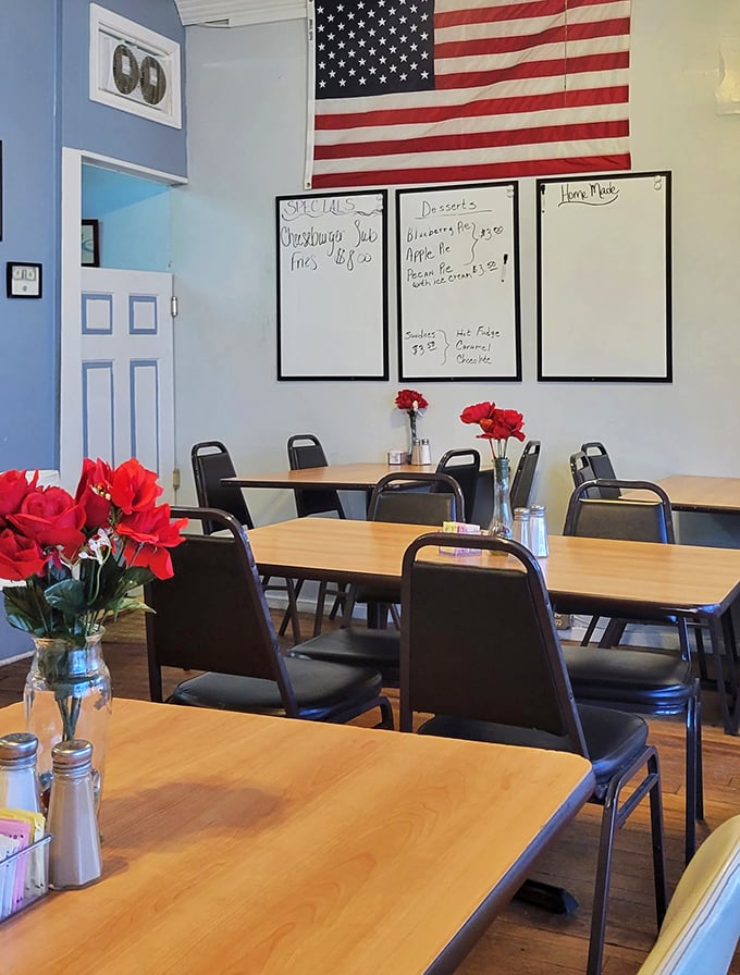 Poinsettias add festive touches to a dining room where whiteboard menus announce daily specials with the straightforward honesty of a trusted friend.