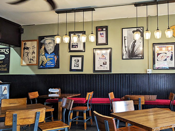 The pendant lights hanging like inverted wine glasses illuminate walls adorned with Rat Pack memorabilia&mdash;setting the perfect old-school mood.