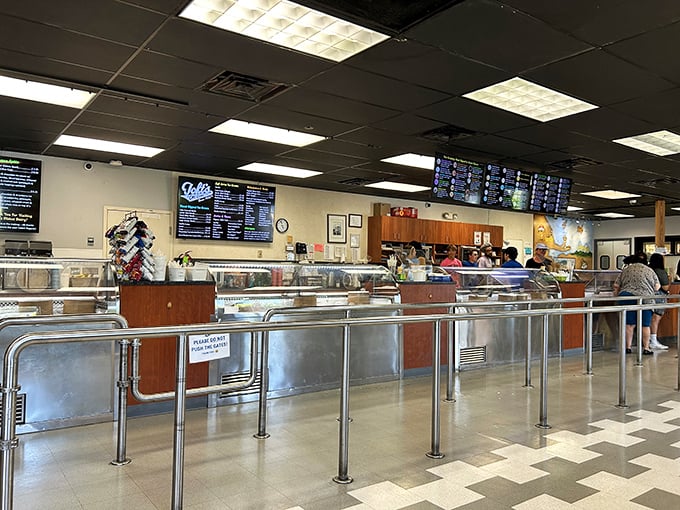 The ordering line: where strangers become comrades united by a common mission. Veterans know exactly what they want; rookies stare wide-eyed at possibilities.