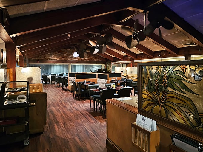 Warm wood tones, comfortable booths, and just the right lighting—like stepping into your fantasy dining room that someone else cleans.