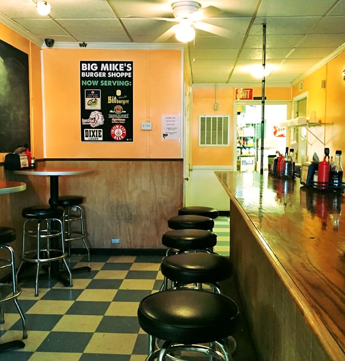 The counter seating isn't just functional&mdash;it's front-row tickets to the greatest show on earth: watching your burger being born.