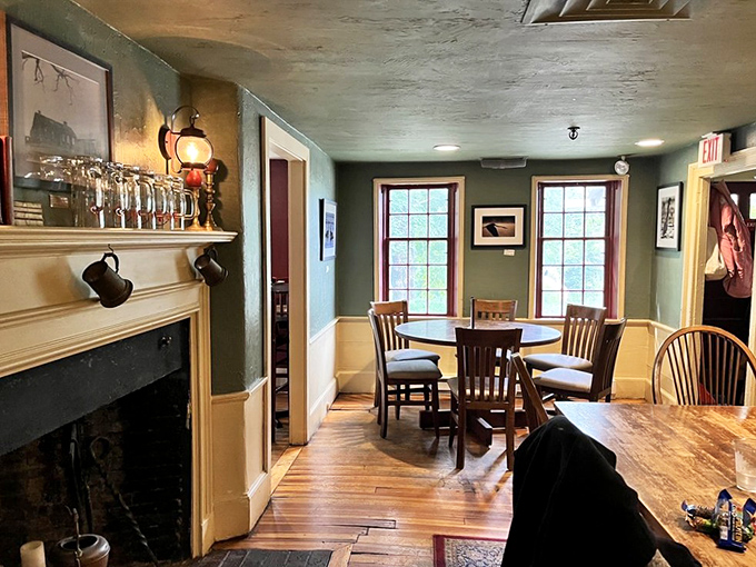 The fireplace corner blends colonial charm with contemporary comfort&mdash;like your favorite history professor decided to open the world's coziest restaurant.