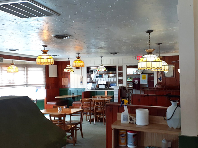 Those pendant lights have witnessed decades of first dates, family celebrations, and regulars who've claimed their favorite spots.