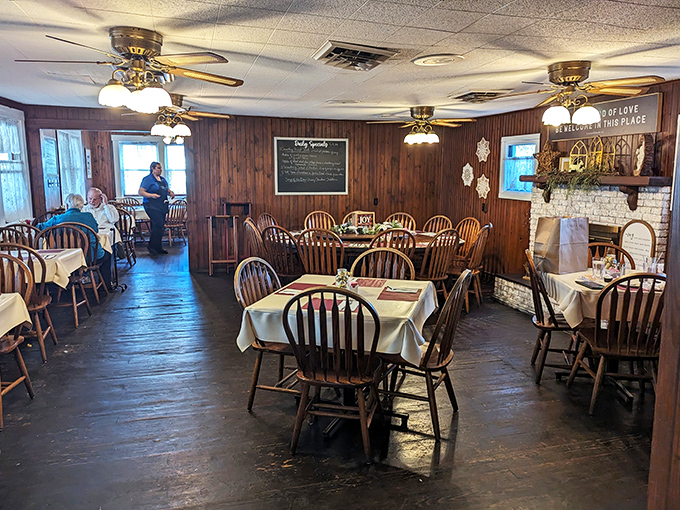 This dining room has hosted more celebrations and comfort-food moments than most therapists. Notice the chalkboard&mdash;daily specials change but quality never does.