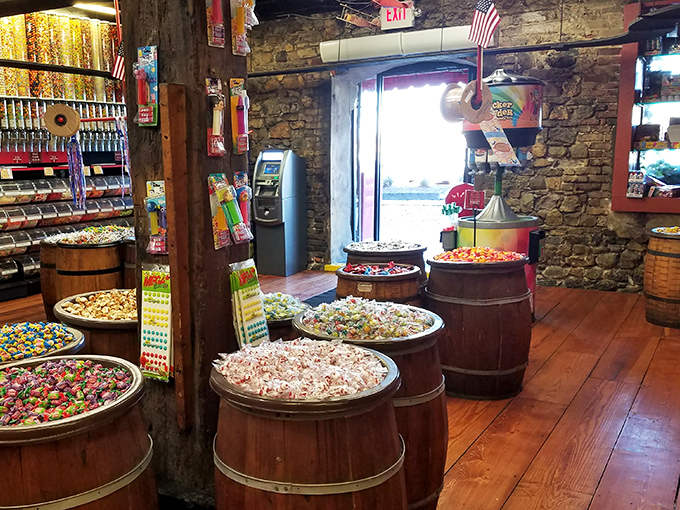 Wooden barrels and brick walls create the perfect rustic backdrop for candy shopping. Like a pirate's treasure room, if pirates hoarded gummy bears instead of gold.