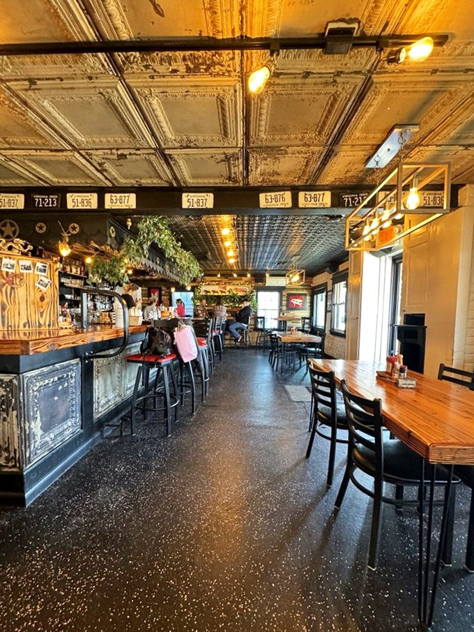 The bar area feels like the coolest friend's kitchen&mdash;if that friend had impeccable taste in vintage d&eacute;cor and craft beverages.