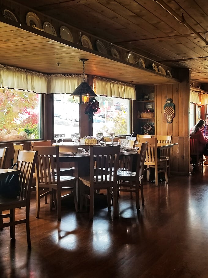 Wooden beams, pendant lights, and plates on display&mdash;this dining room has hosted more meaningful conversations than most therapists' offices.