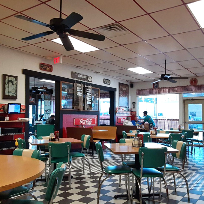 The dining room feels like it's been waiting for you all along. Every seat has a story, and the ceiling fans keep the breakfast aromas properly circulated.
