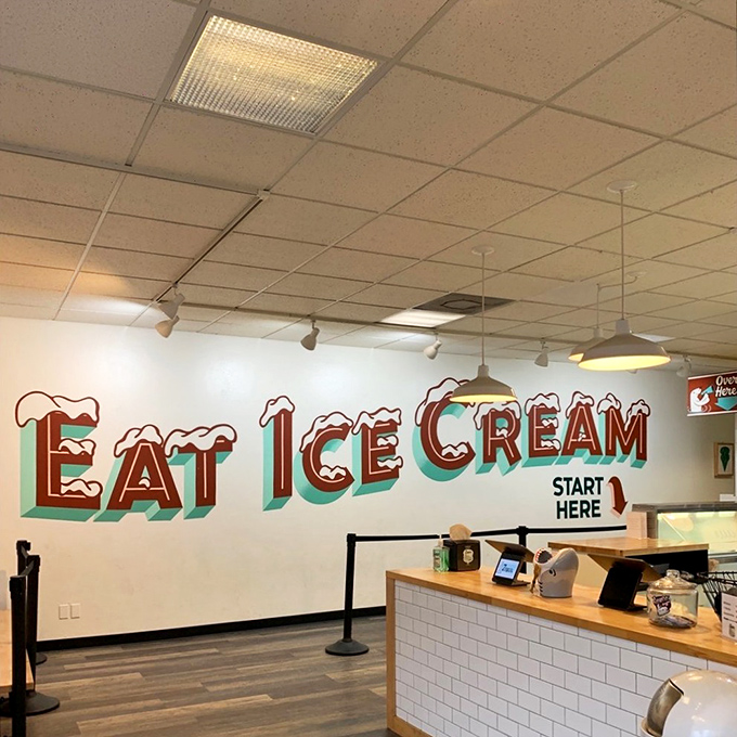 The line forms here for happiness. Clean white subway tiles and wooden countertops frame the stage where frozen dreams come true. 