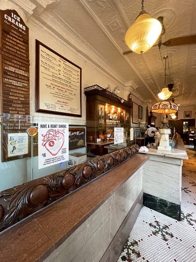 The mosaic floor and carved wooden counter aren't decorations&mdash;they're time machines to when soda jerks were celebrities and ice cream was an event.