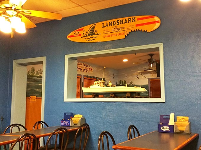 Nautical touches and a Landshark surfboard transform this dining room into a coastal getaway, no sunscreen required.