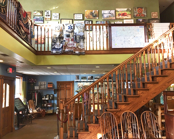 The wooden staircase and gallery wall create a homey atmosphere that says, "Stay awhile, the pie isn't going anywhere"—though it absolutely will if you don't order quickly.