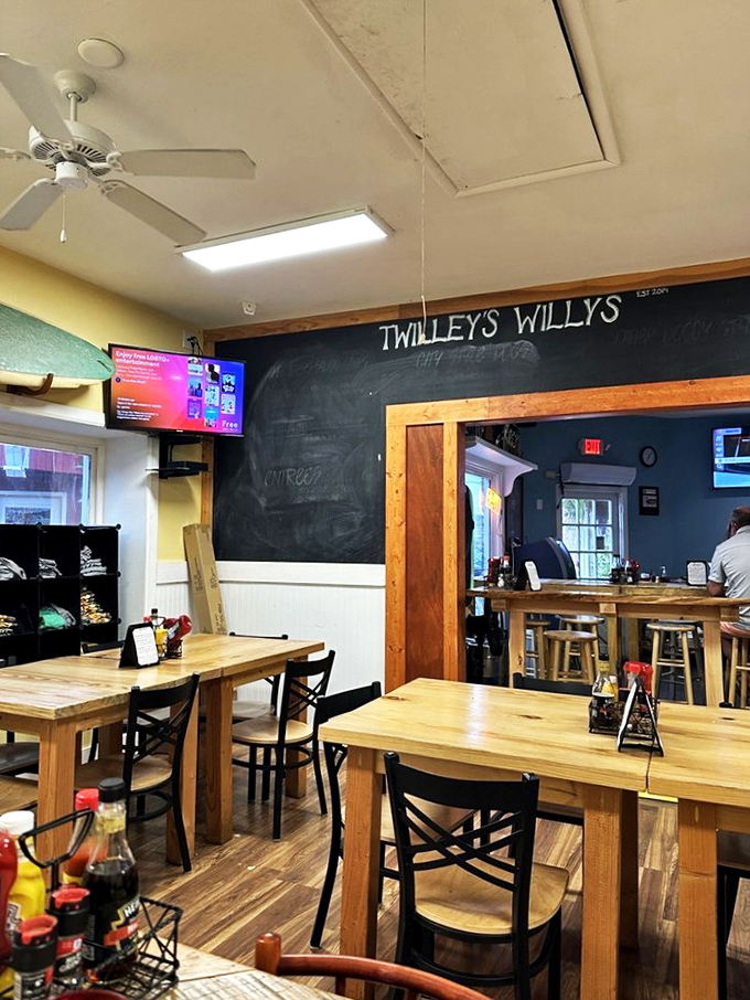 The chalkboard wall announces your arrival at hot dog heaven. Those wooden tables have heard countless "mmms" and "wows" over the years.