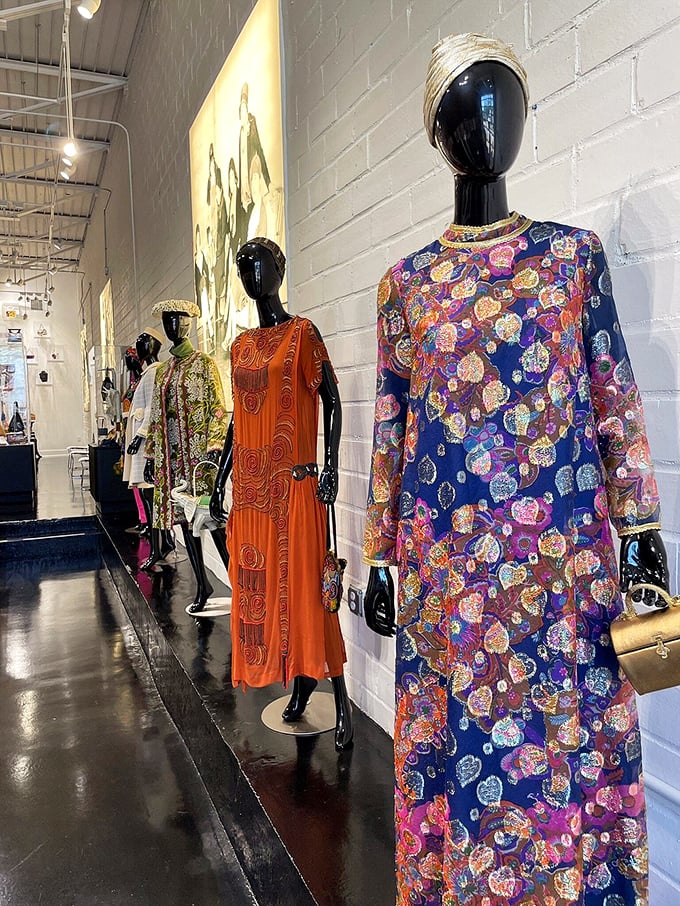 Vintage fashion mannequins showcase how clothing and handbags evolved together, like dance partners through the decades.