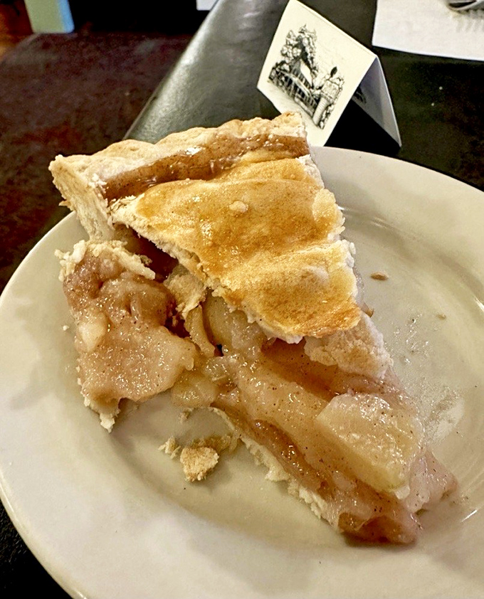 Apple pie that doesn't just remind you of home—it makes you wonder why you ever left. Flaky crust housing cinnamon-kissed apples in perfect harmony.
