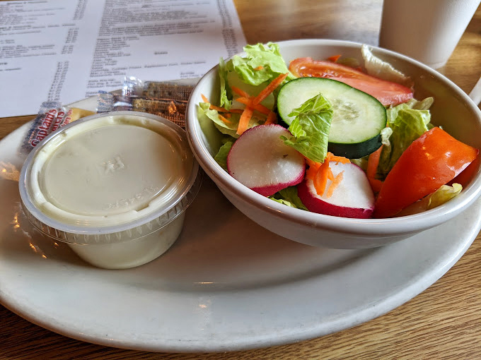 Even salads get the royal treatment at Waffle Hut. Fresh, colorful, and large enough to make you forget you actually came for waffles.