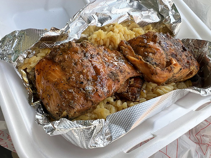 Atlanta Street Salmon over rice&mdash;proof that not everything delicious here needs to be fried. Though frying doesn't hurt.