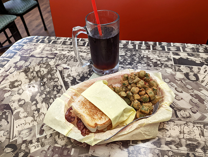 The sandwich-okra combination: where Texas tradition meets comfort food perfection on a plate lined with wax paper memories.