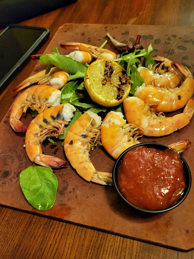 These plump shrimp, kissed by flame and nestled on greens, make seafood in the landlocked Midwest feel like a coastal revelation.