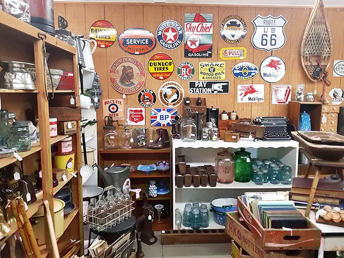 A wall of automotive nostalgia where Route 66 meets Texaco, reminding us when gas stations had personality and style.