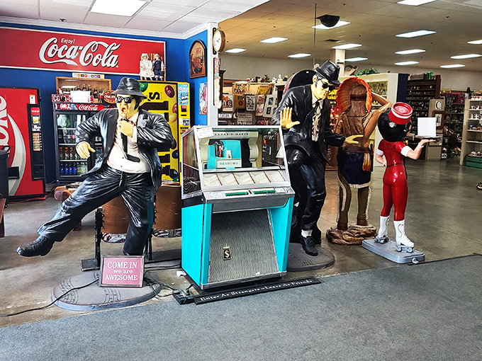 The Blues Brothers stand frozen in time, guarding a vintage jukebox that probably still remembers the hits of '59.