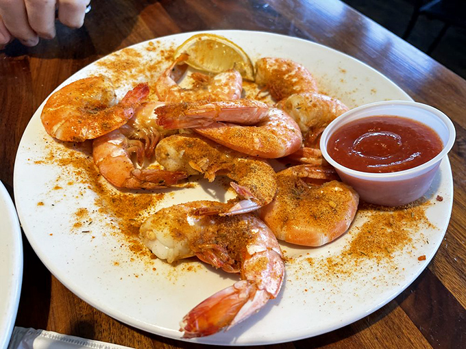These spiced shrimp aren't just food&mdash;they're a sunset-colored celebration on a plate. The dusting of seasoning is practically winking at you.