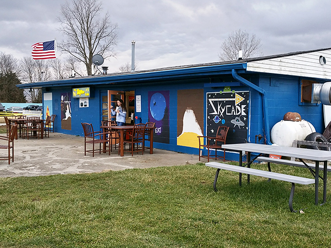 The humble concession patio, where pre-show conversations flow as freely as the fountain drinks and anticipation builds for the feature.