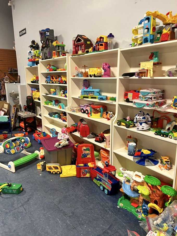 The toy section is a nostalgic playground for kids and grown-ups alike. Childhood memories line these shelves, waiting for a second chance to create joy.
